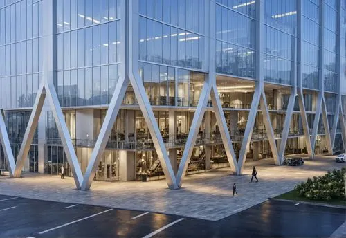 the front entrance of a building with a clock tower